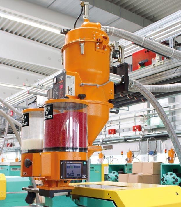 Coloring device with volumetric dosing - AJ Solutions